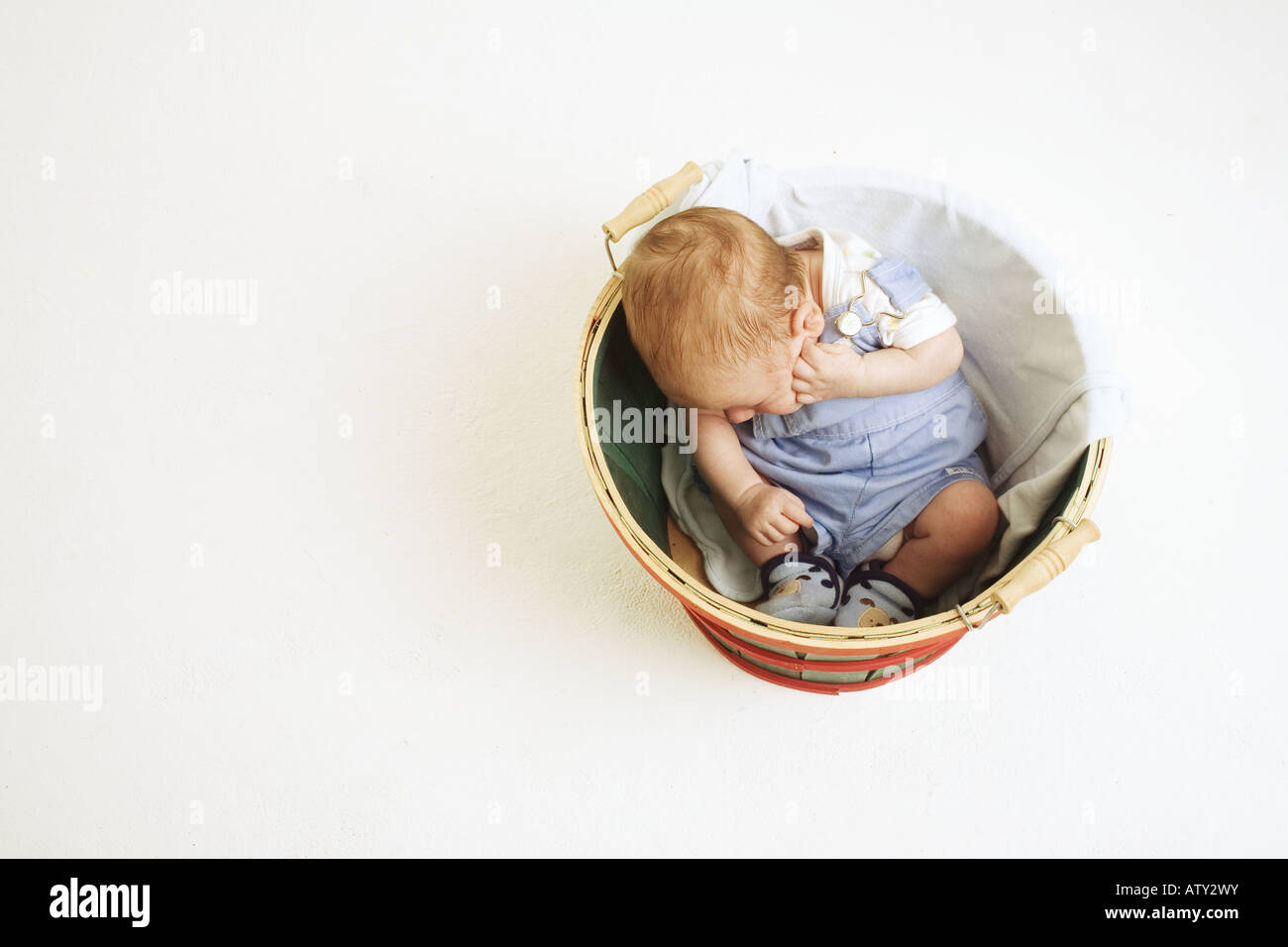 Curled baby portrait hi-res stock photography and images - Alamy