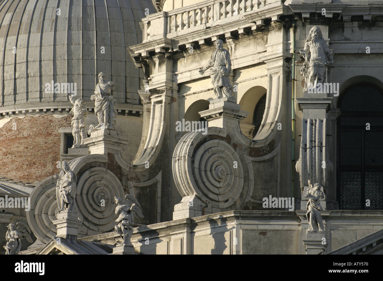 Santa Maria Della Salute dome detail scroll statue Stock Photo - Alamy