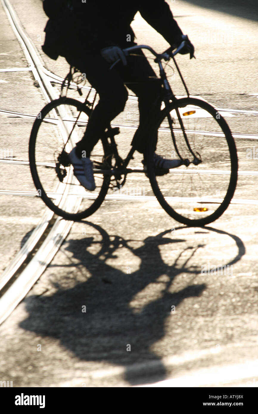 man riding bike in city Stock Photo - Alamy