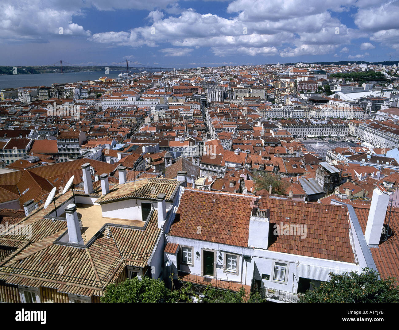 rooftops and streets of Baixa with distant view of Tejo River Stock ...