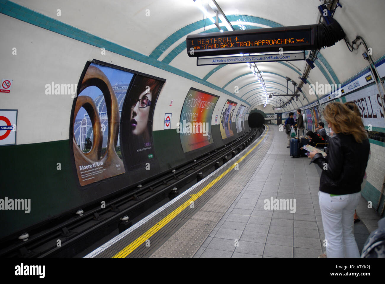 Underground tube staion at Russell Square while train approaching ...