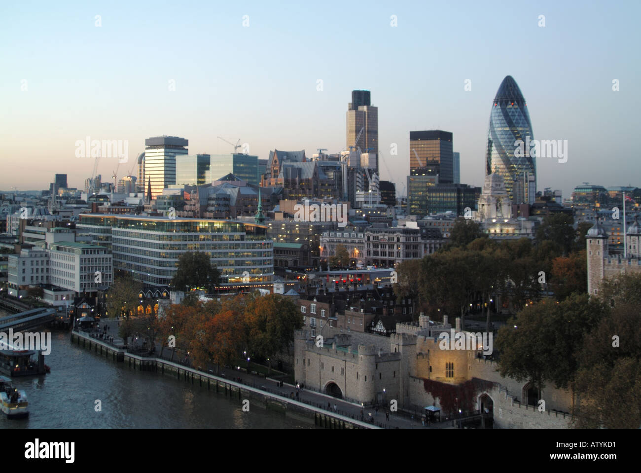 Dusk semi aerial view Pool of London & City skyline with Tower Of ...