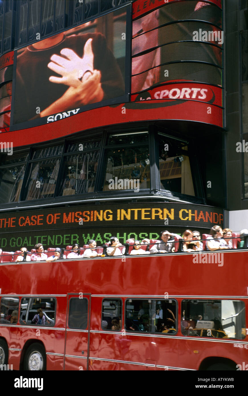 Red sight seeing bus in Times Square New York Stock Photo - Alamy