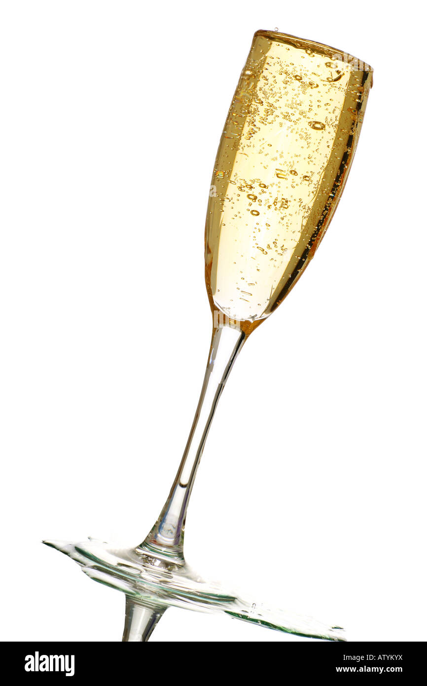 over flowing glass of champagne with lots of bubbles Stock Photo - Alamy