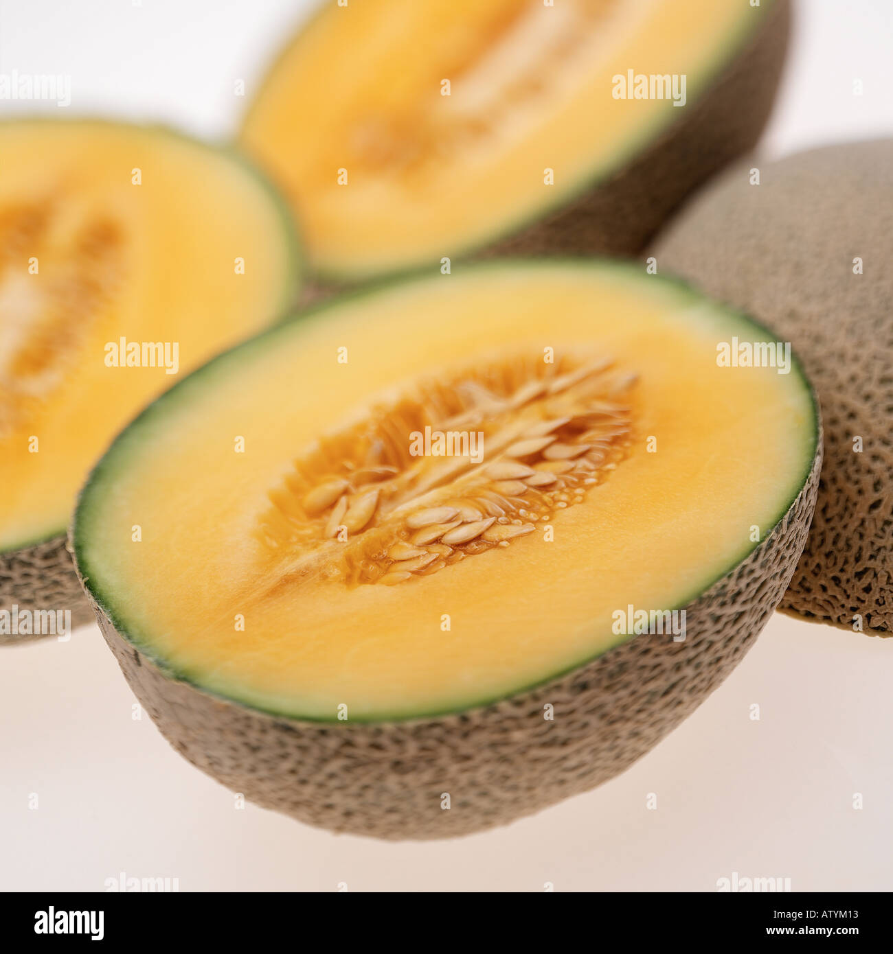 Cantaloupe Melons cut in half Stock Photo - Alamy