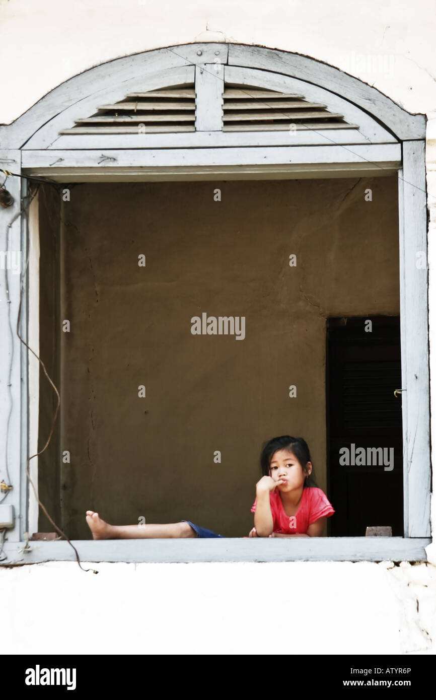 Girl on the Window Stock Photo - Alamy