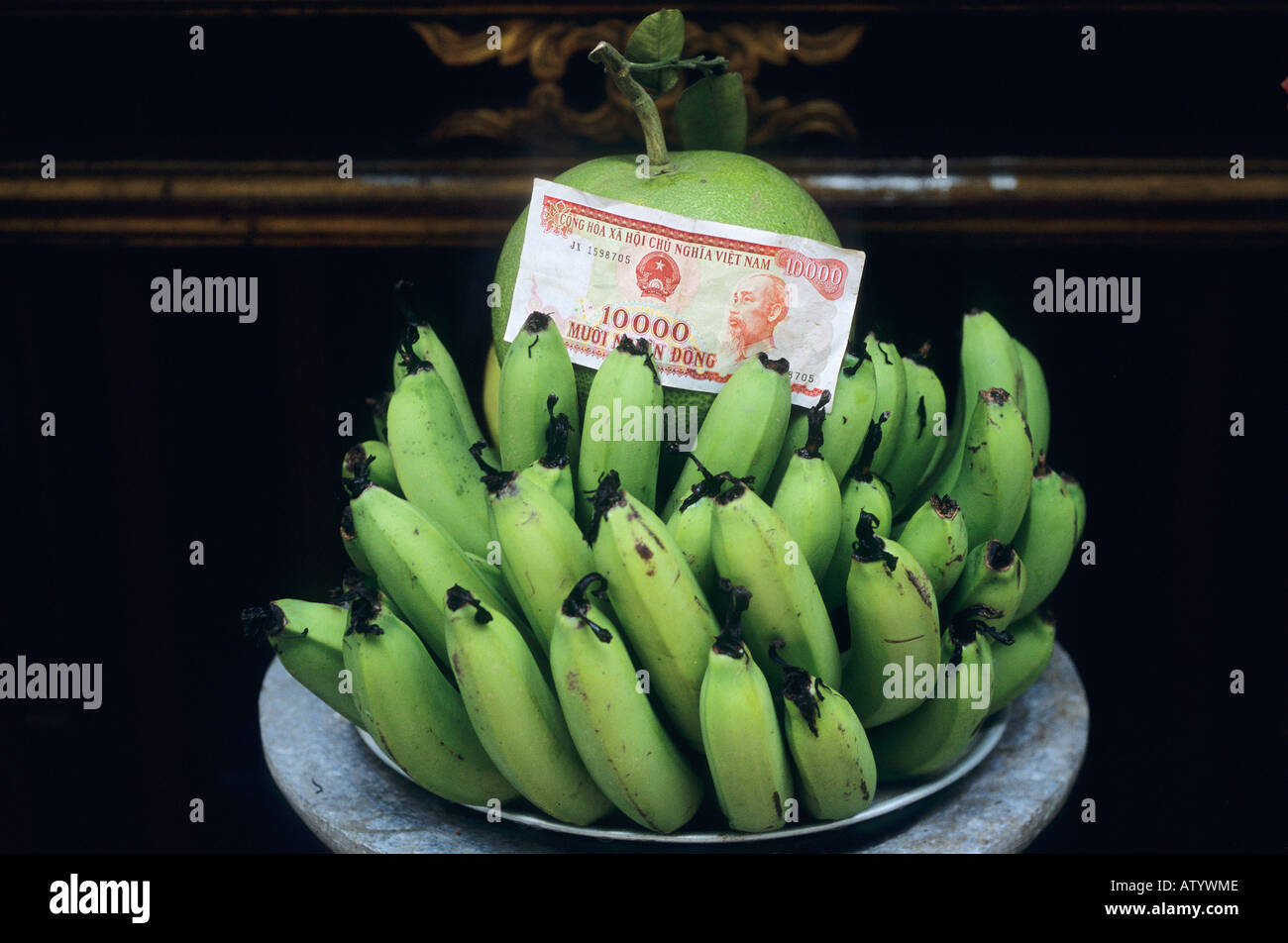 Banana and money offering at Hung Tombs Stock Photo - Alamy