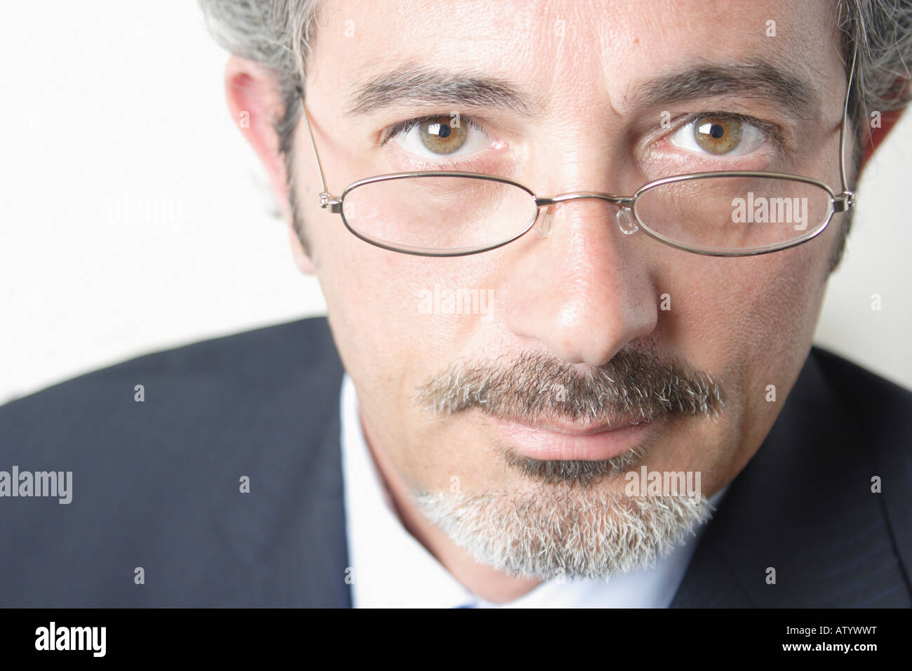 mature business man staring Stock Photo - Alamy
