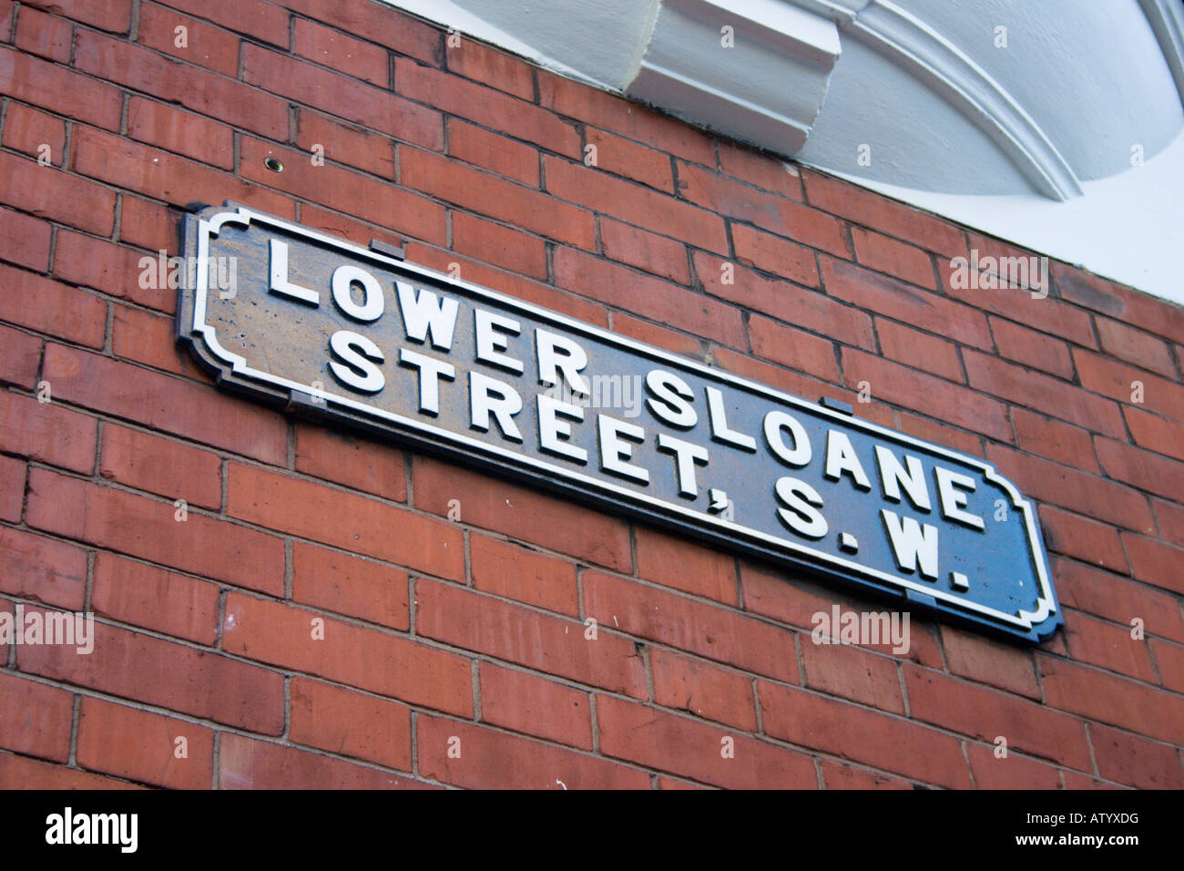 Lower Sloane Street London SW1 street name sign Stock Photo - Alamy