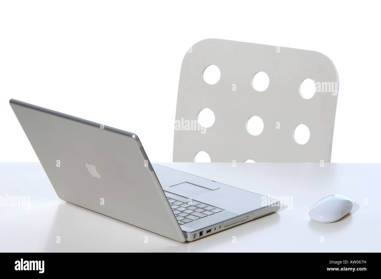 desk with laptop and mouse Stock Photo - Alamy