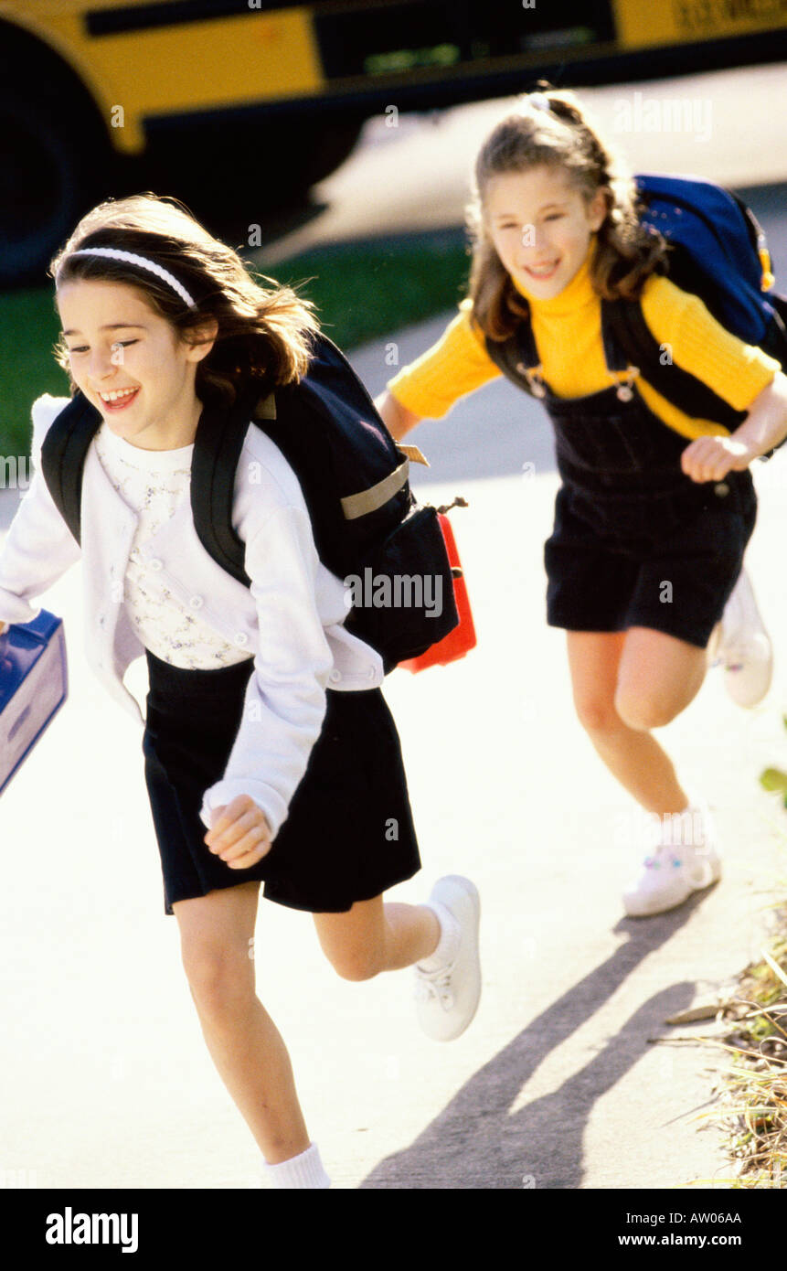 School pupils kids rushing school hi-res stock photography and images ...