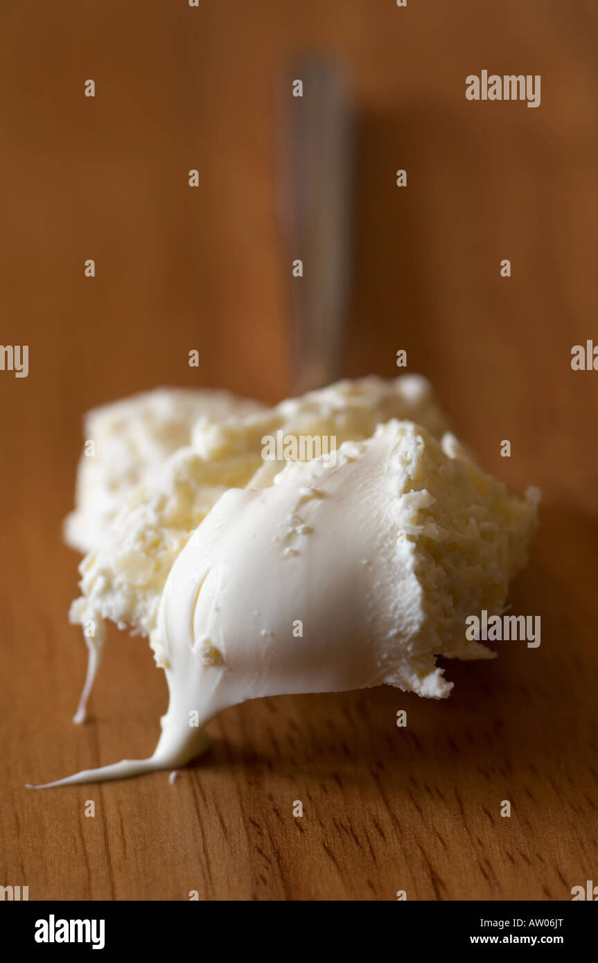 Spoonful of clotted cream Stock Photo - Alamy