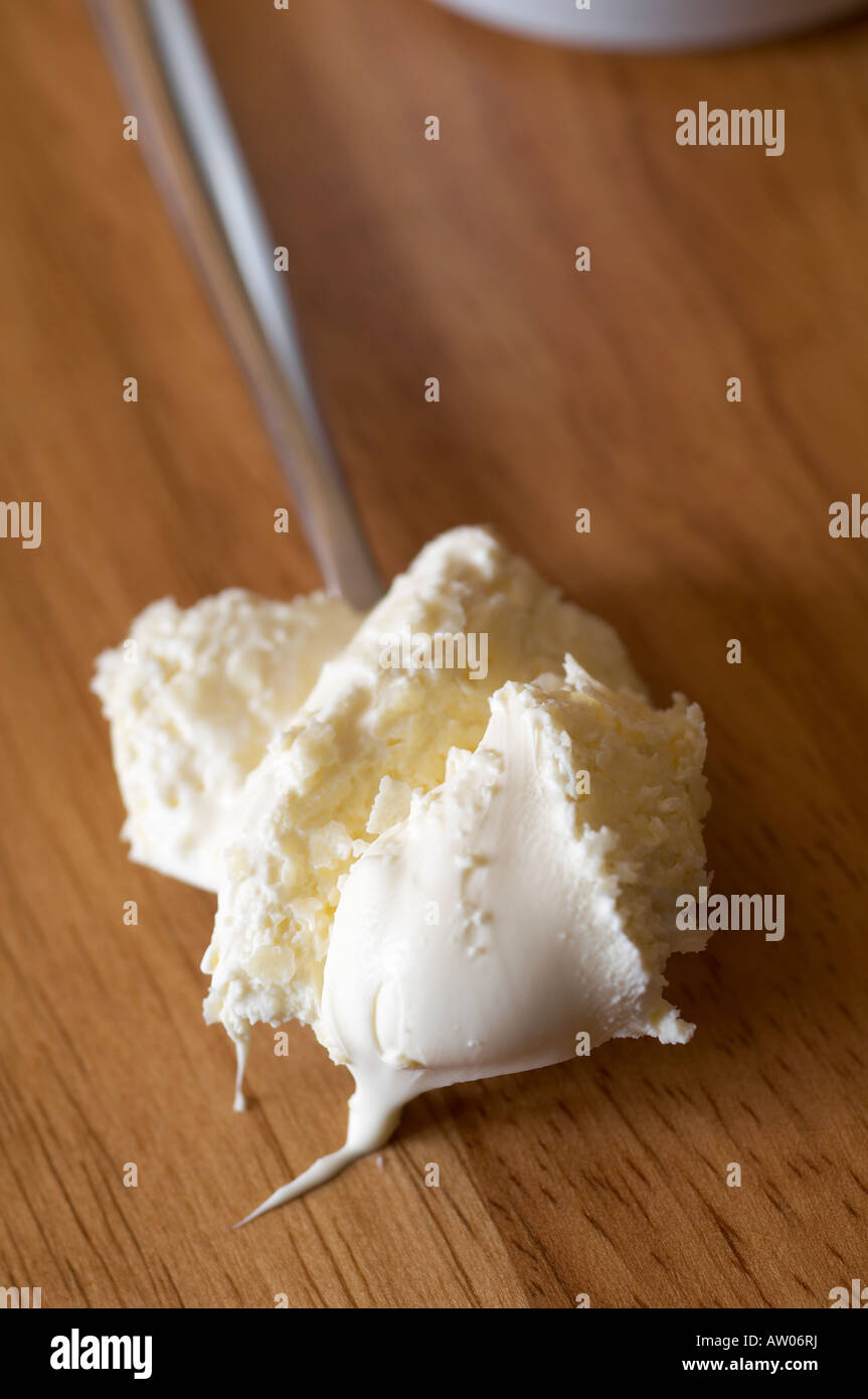Spoonful of clotted cream Stock Photo - Alamy