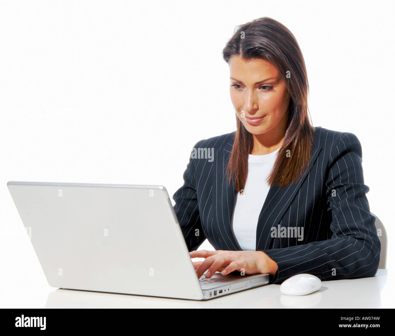 Businesswoman using laptop computer Stock Photo - Alamy