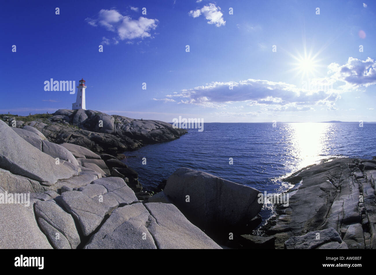 Canada Nova Scotia Peggy s Cove Lighthouse and granite shoreline with ...