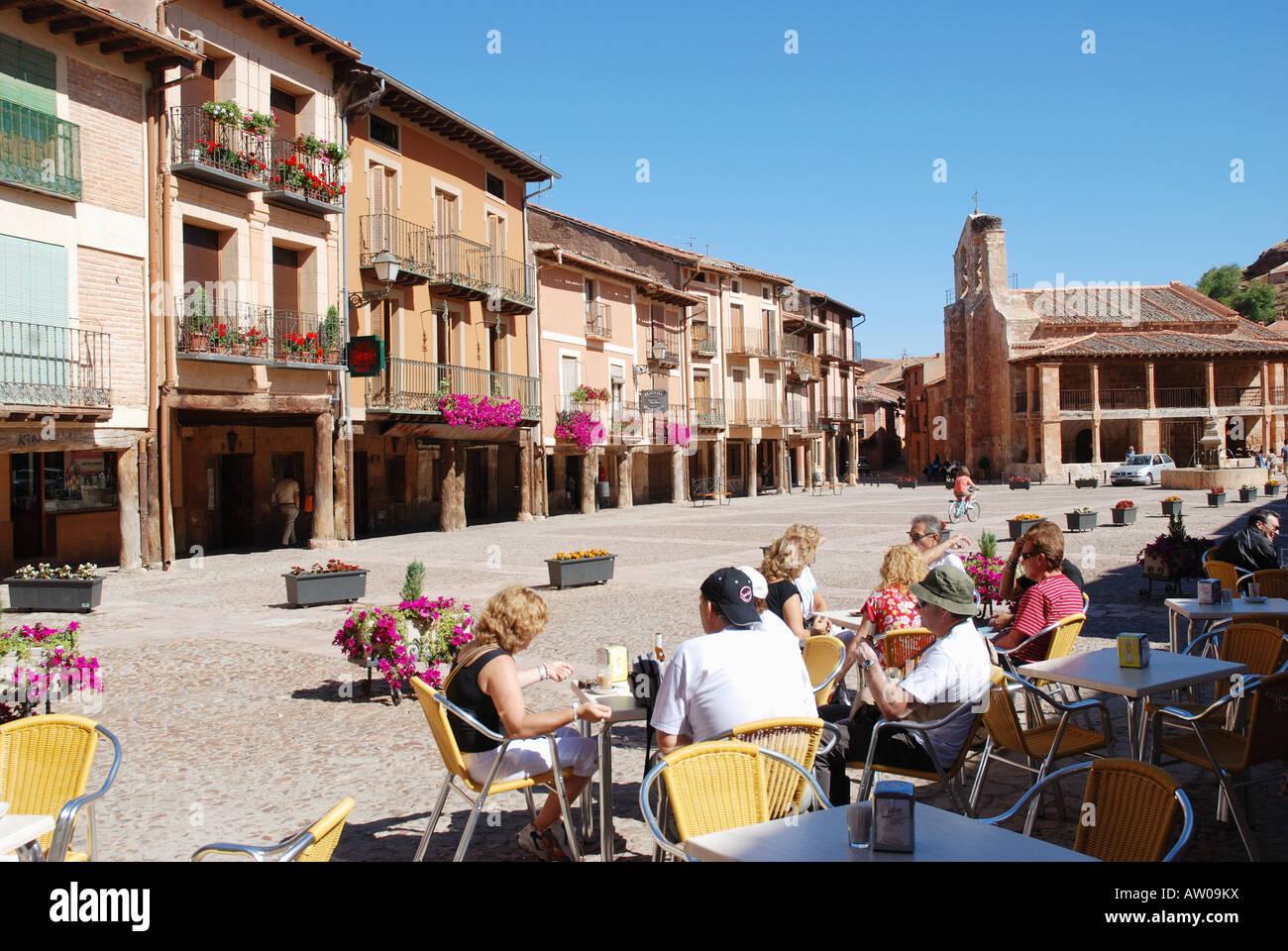 People sitting on terrace at the Main Square. Ayllon. Segovia province ...