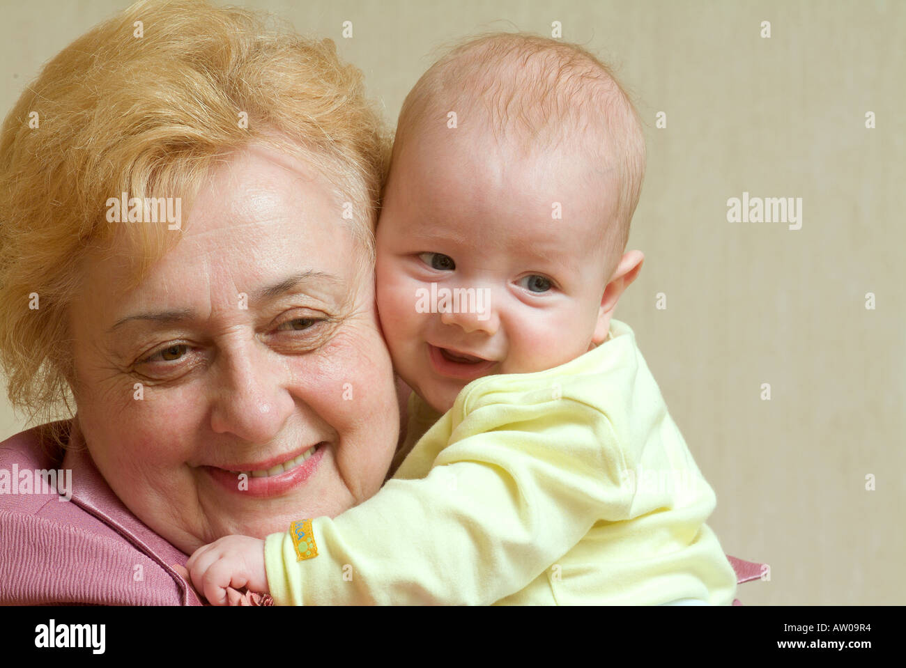 portrait of grandmother hugging her baby grandchild Stock Photo - Alamy