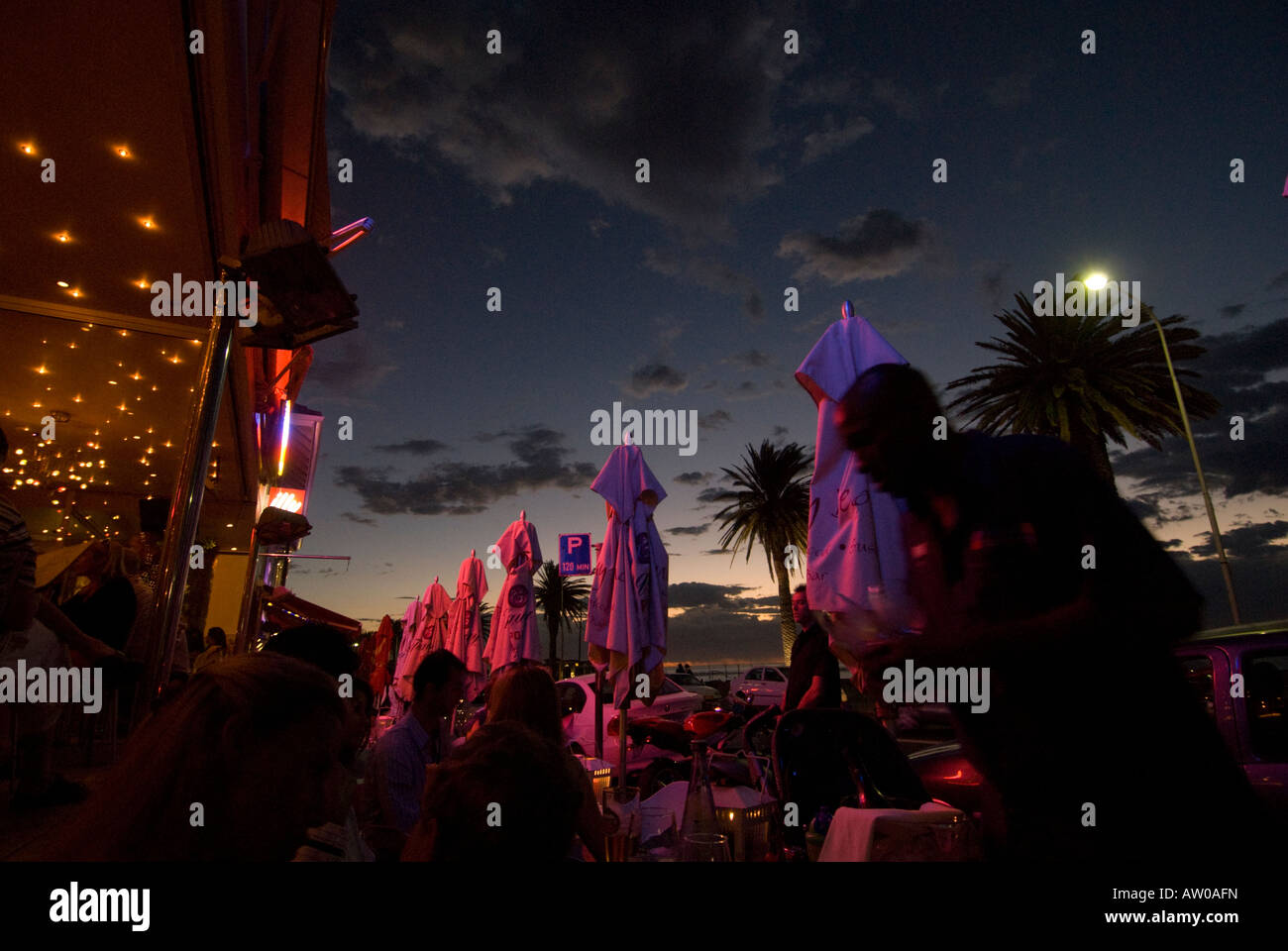 Camps Bay Promenade at Night with glow from neon lights Stock Photo - Alamy