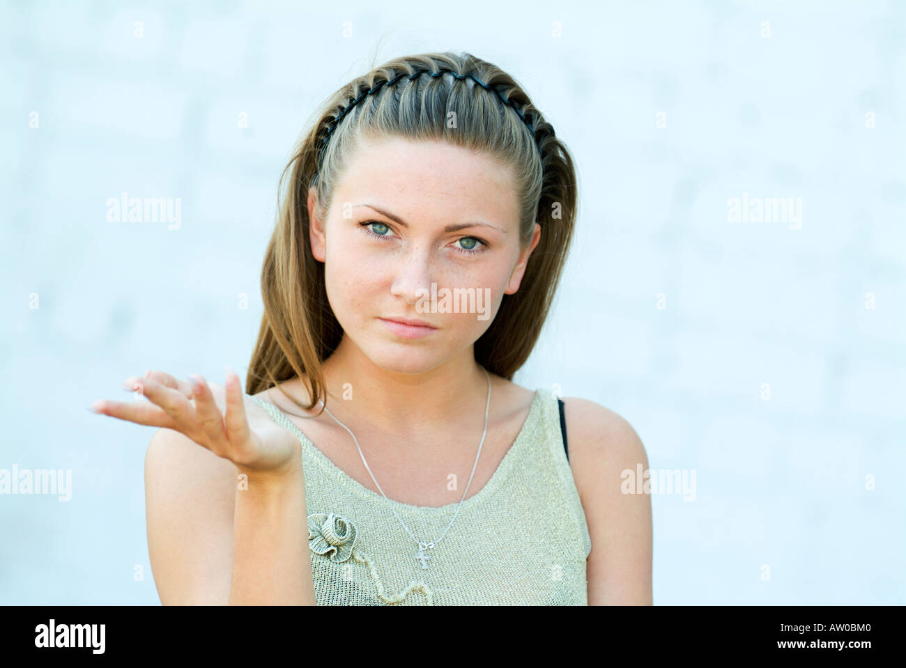 young woman making gesture of asking Stock Photo - Alamy