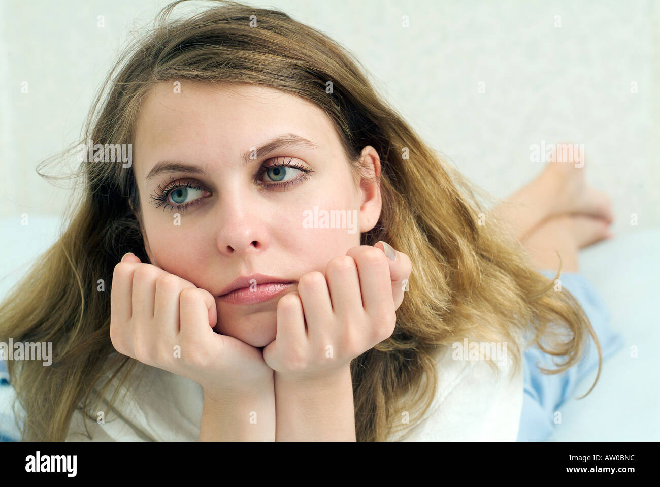 portrait of bored looking teenage girl Stock Photo - Alamy