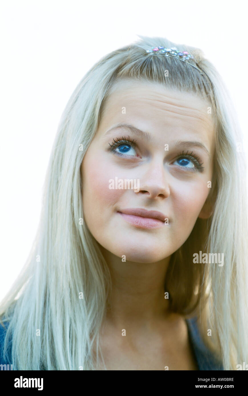 portrait of thoughtful looking young woman Stock Photo - Alamy