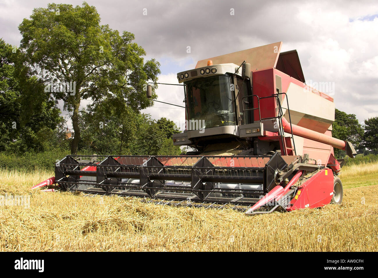 A combine harvester on a U.K. farm Stock Photo - Alamy