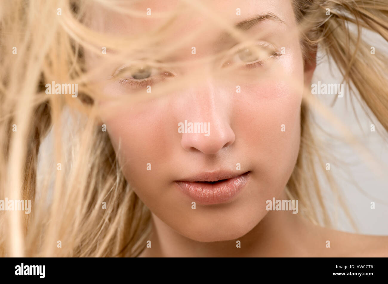 portrait of young woman with confused hair Stock Photo - Alamy