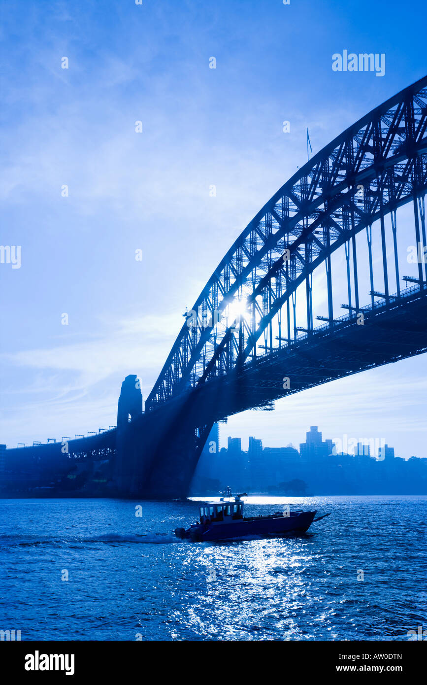 Boat under bridge Stock Photo - Alamy