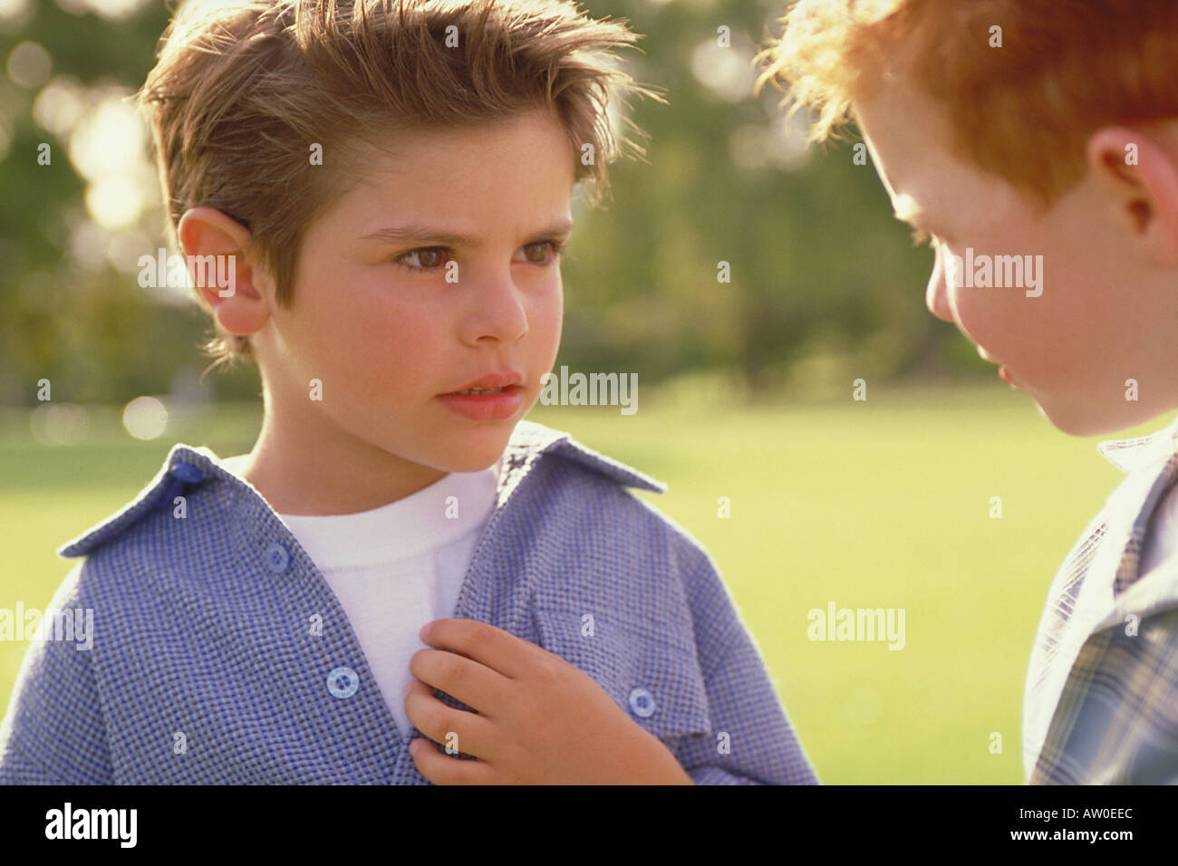 Two boys talking garden hi-res stock photography and images - Alamy