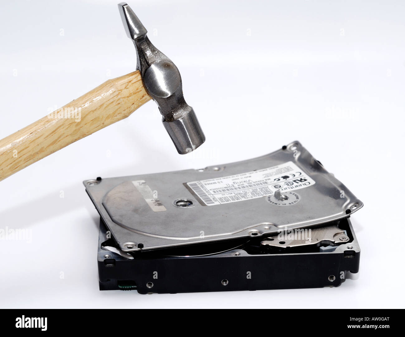 Smashing hard disc drive with hammer Stock Photo - Alamy
