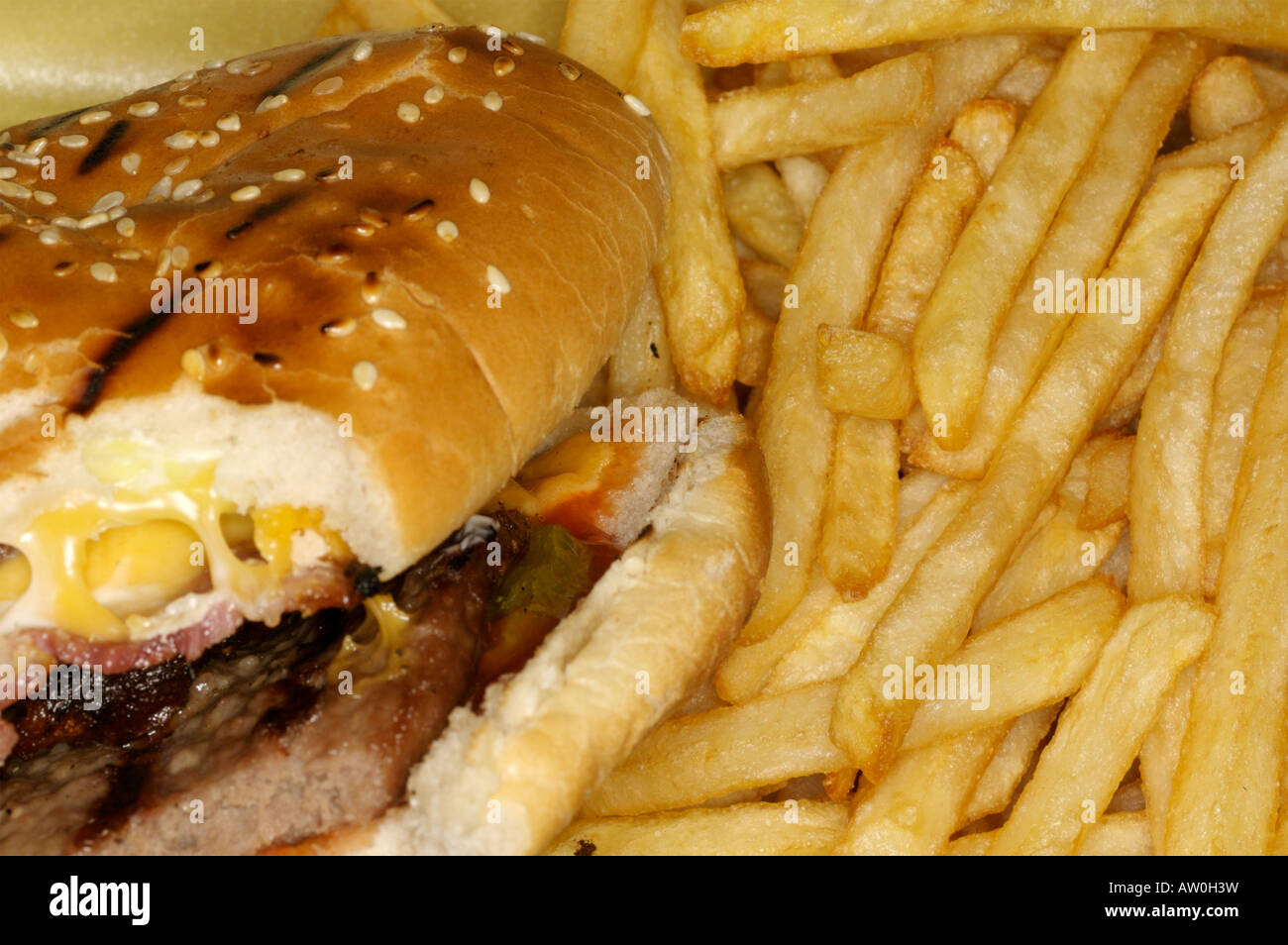 Beefburger and Cheese and chips Stock Photo - Alamy