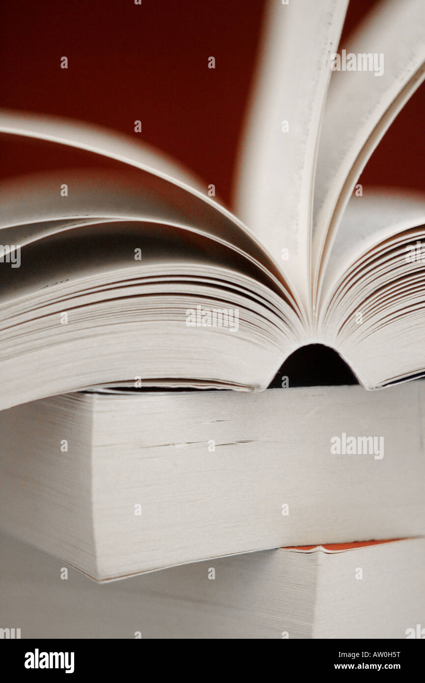 Flicking paper hi-res stock photography and images - Alamy