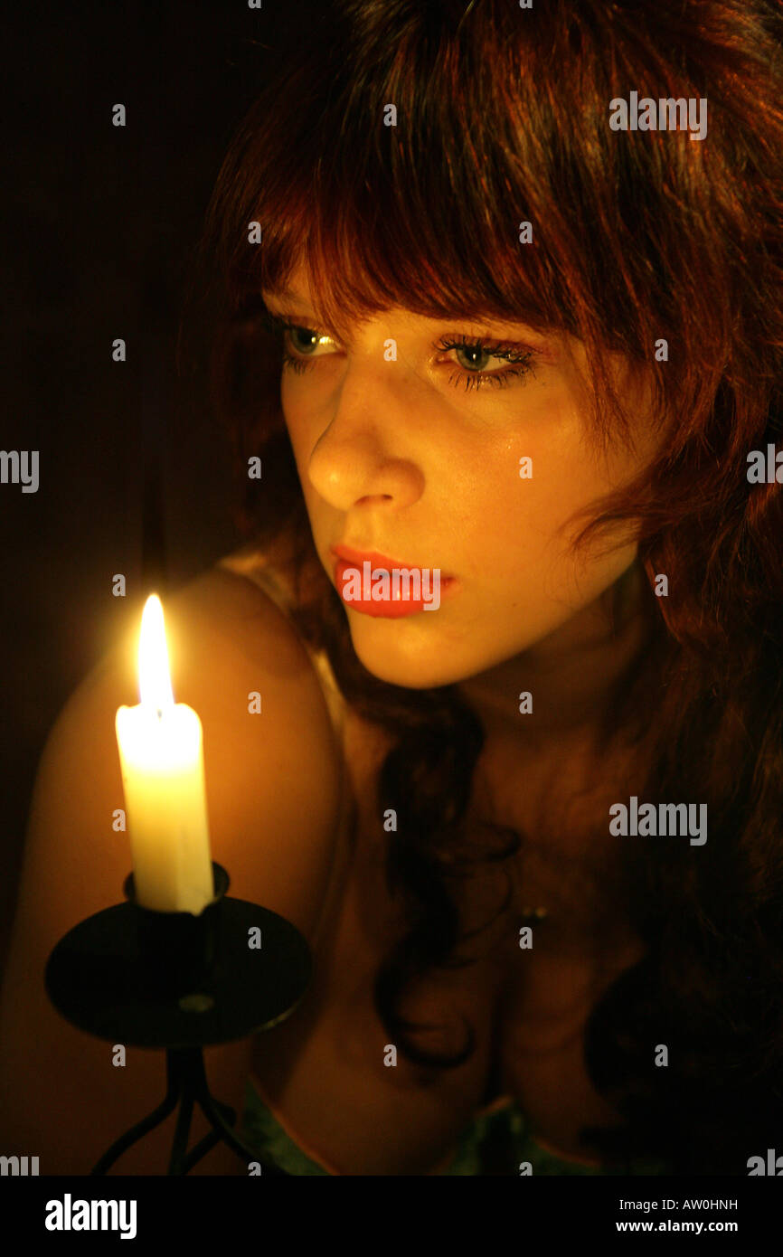 Portrait of a Young Girl by Candlelight Stock Photo - Alamy