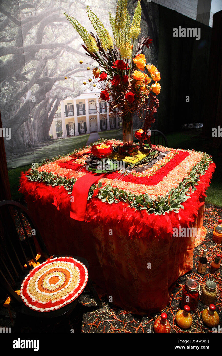 Beautiful ornate table trimmed in red feathers and rest of ‘table cloth ...