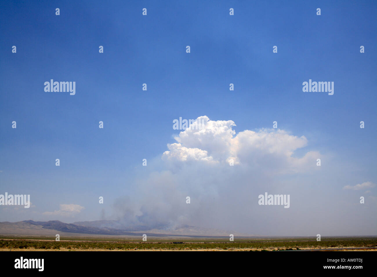 Smoke from a small range fire burning North of US Interstate highway 80 ...