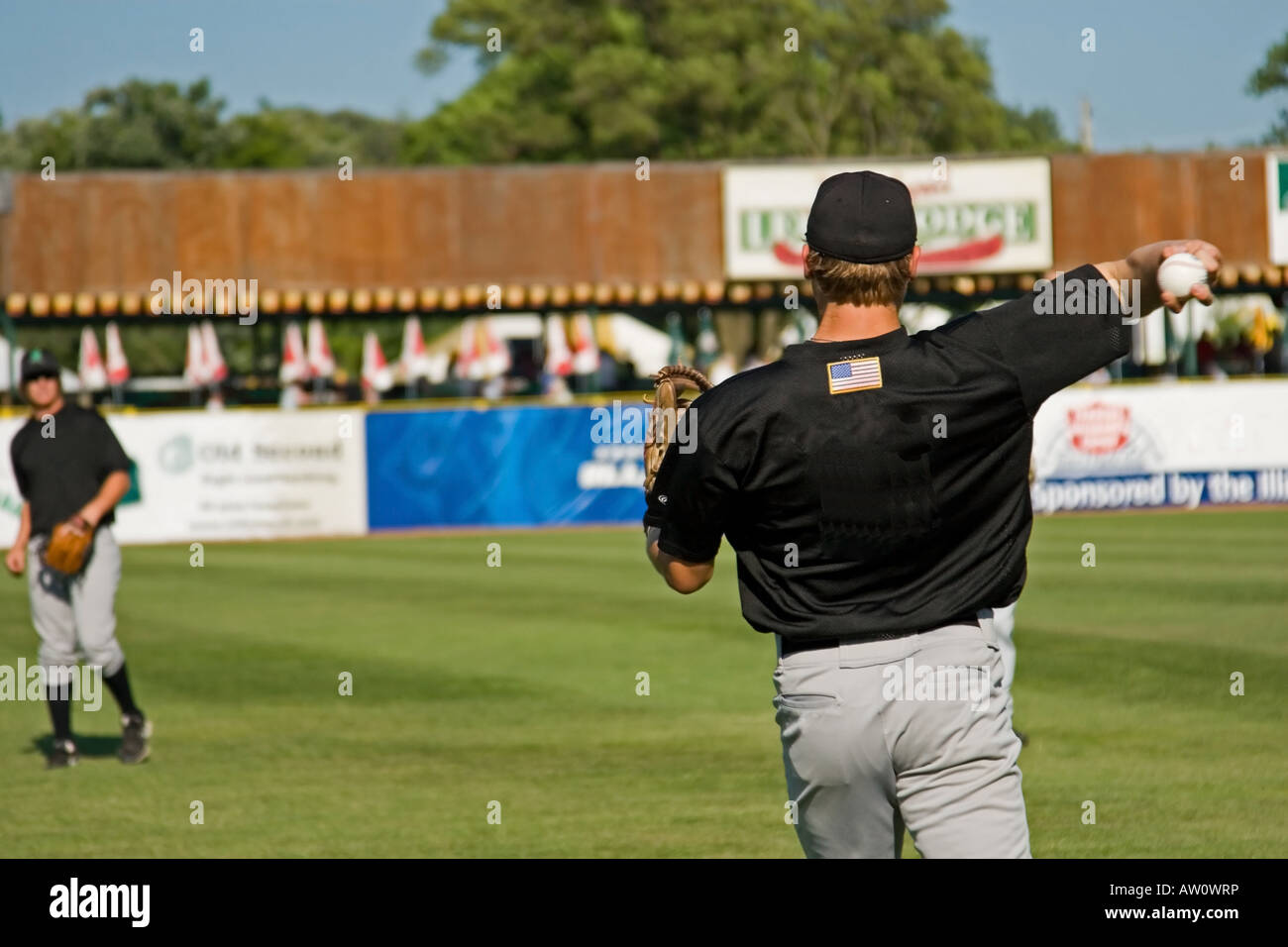 Baseball players playing the sport they love at a small stadium of the ...
