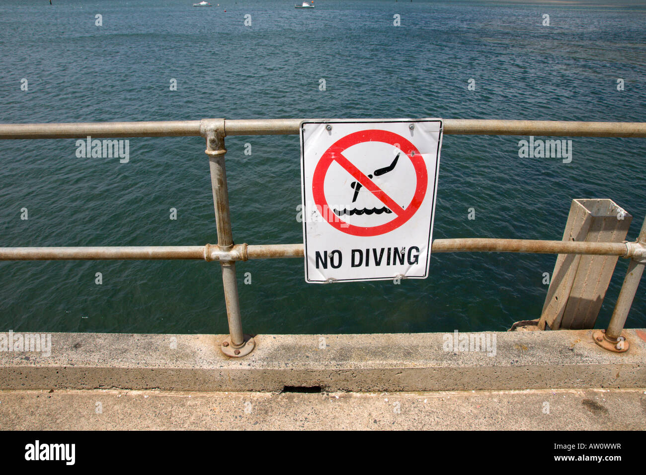 No diving sign on Stoney Point Pier Victoria Australia Stock Photo - Alamy