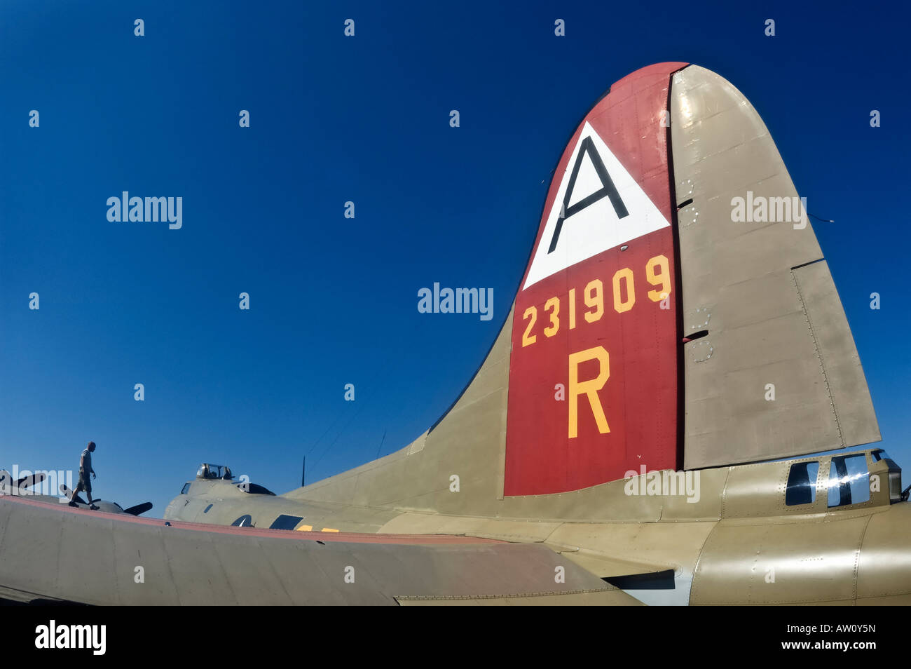 man atop wing of world war 2 bomber B 17 for refueling at Wings of ...
