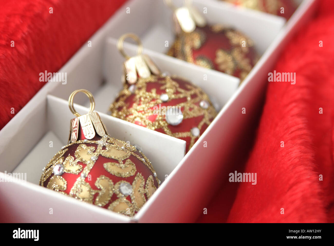 Three red christmas bauble decorations Stock Photo - Alamy