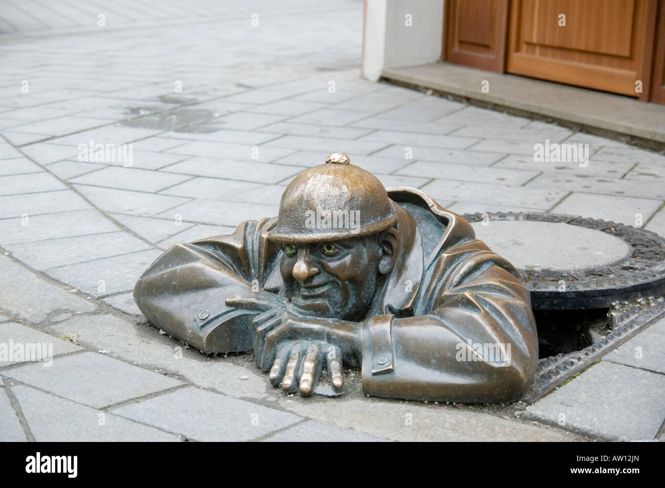 Man at work statue, Bratislava, Slovakia Stock Photo - Alamy