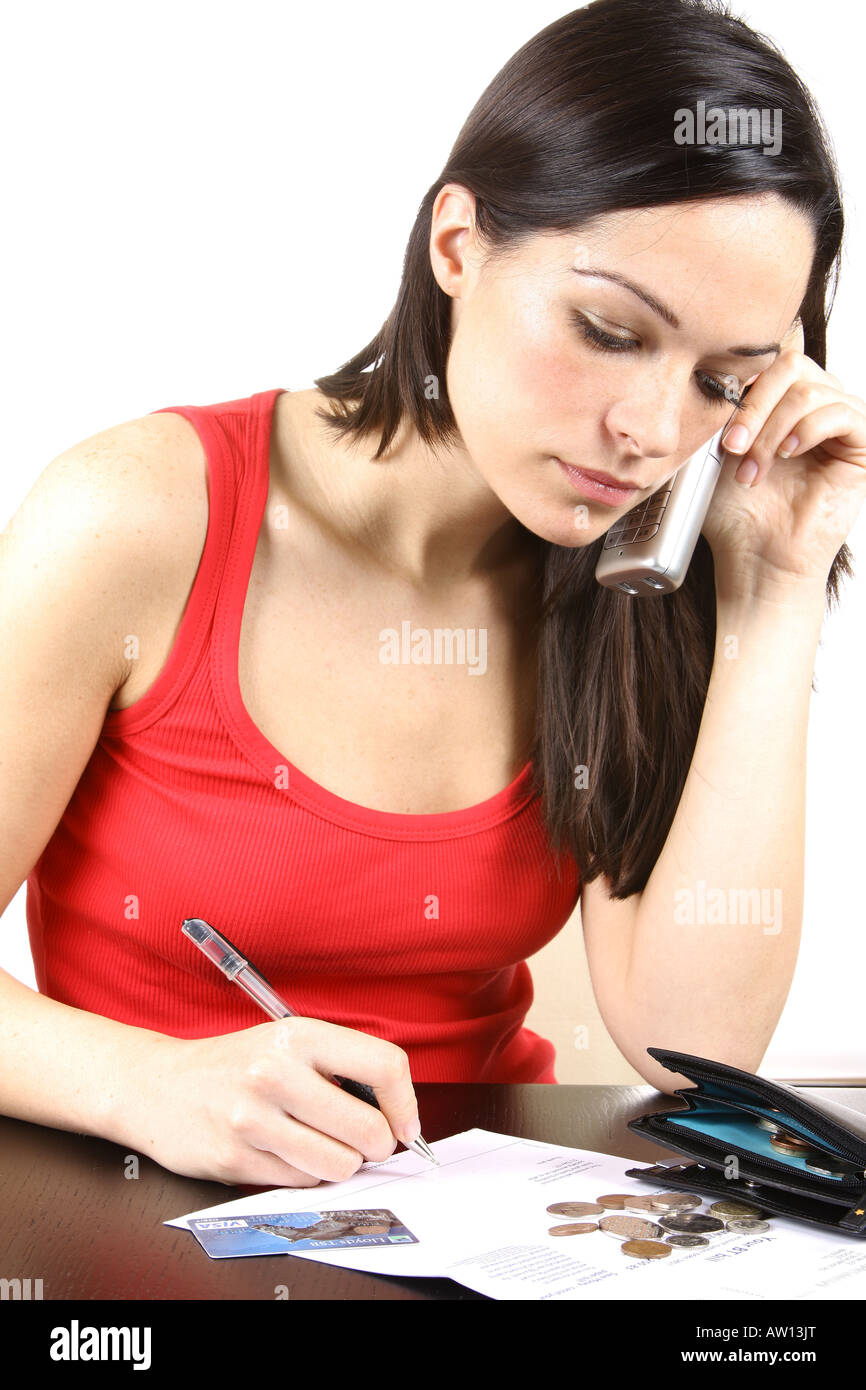 Young Woman Paying Telephone Bill Model Released Stock Photo - Alamy