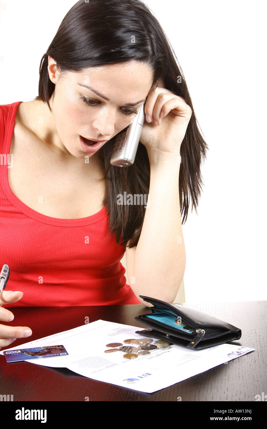 Young Woman Paying Telephone Bill Model Released Stock Photo - Alamy