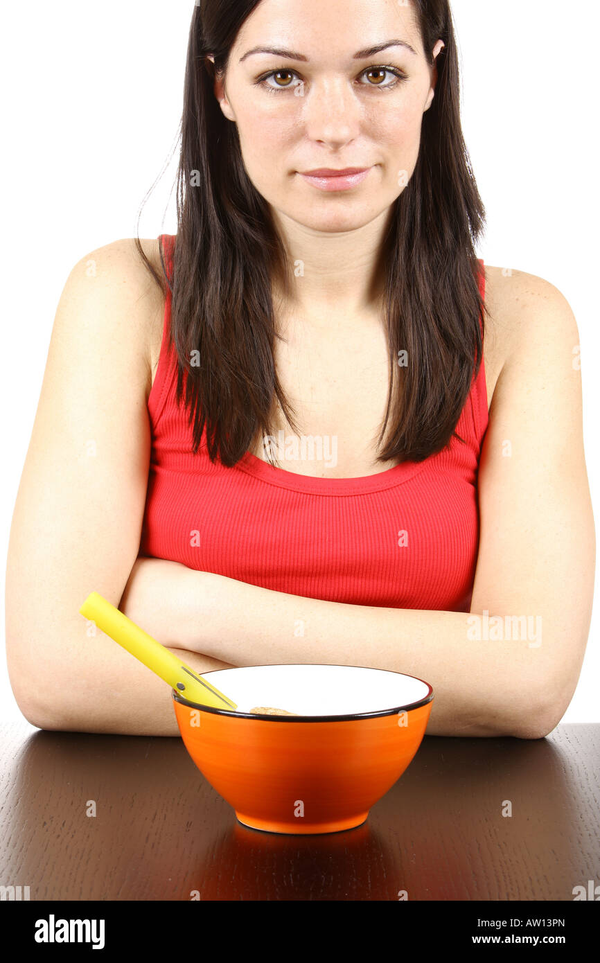 Young Woman with Empty Cereal Bowl Model Released Stock Photo - Alamy