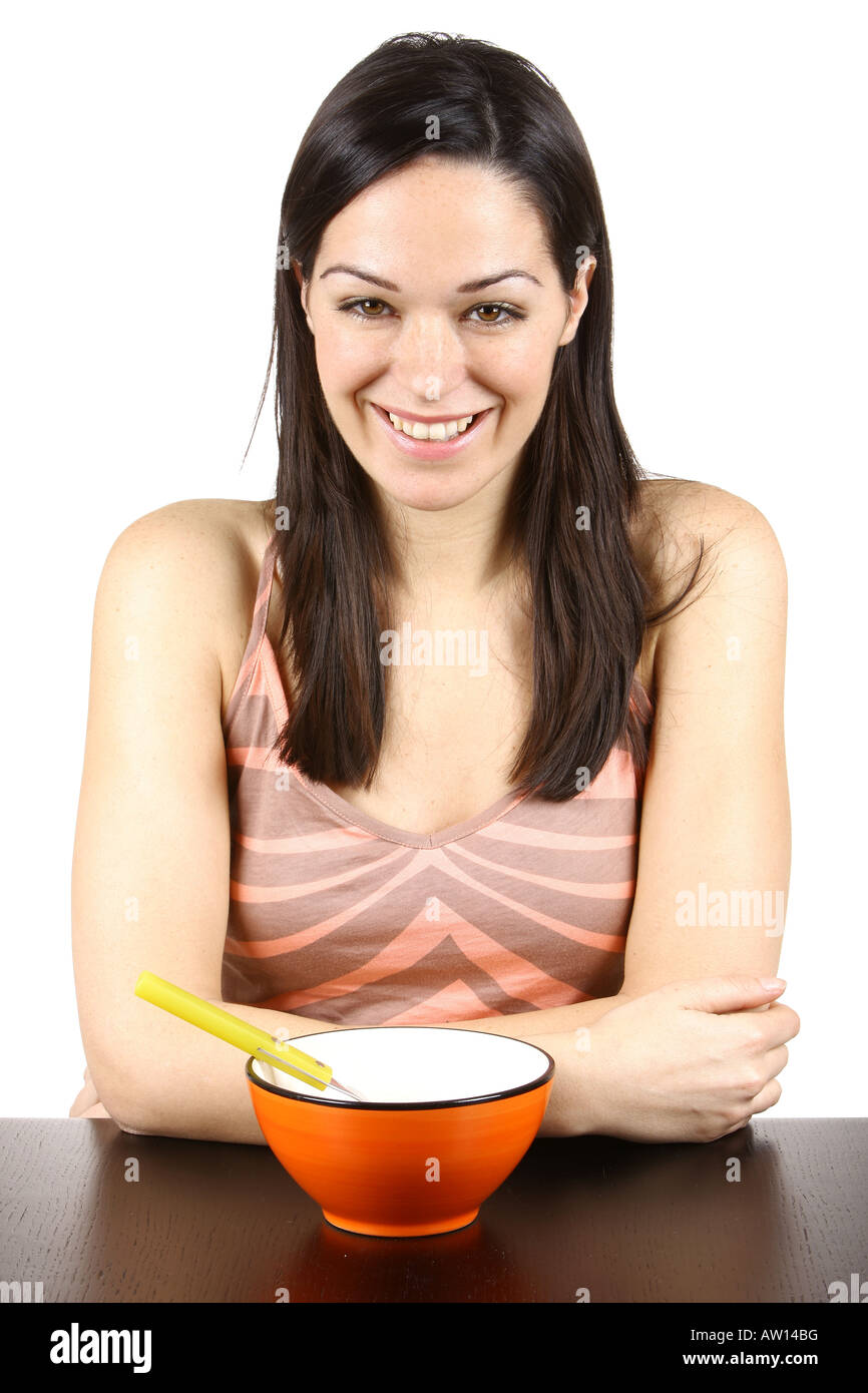 Young Woman with Empty Cereal Bowl Model Released Stock Photo - Alamy