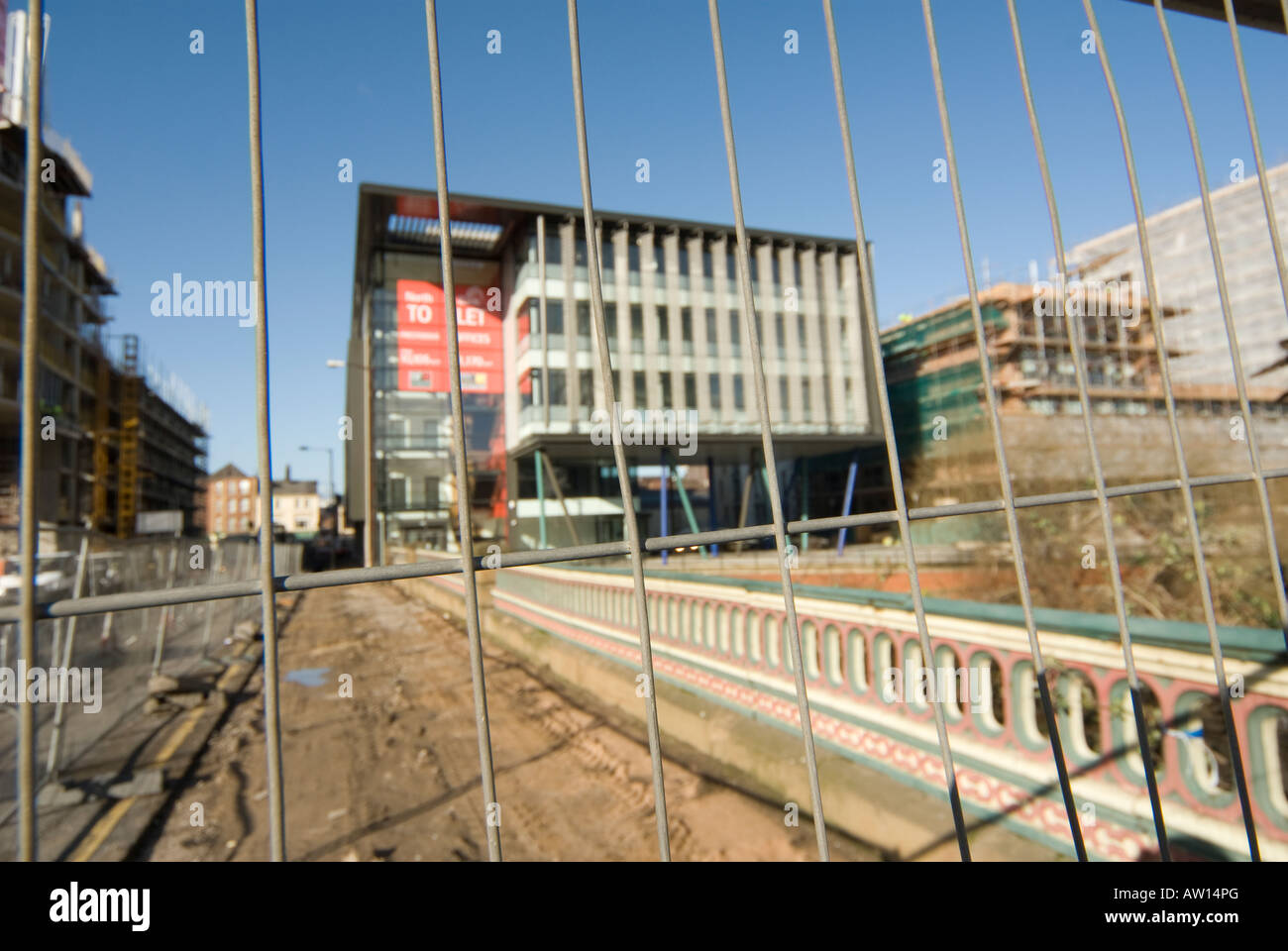 steel fencing surrounding urban development and regeneration in ...
