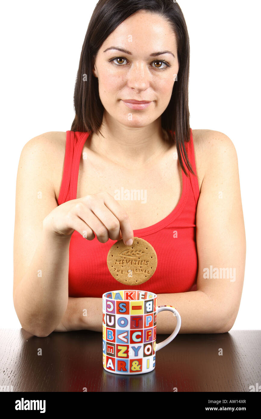 Dipping biscuit in tea hi-res stock photography and images - Alamy