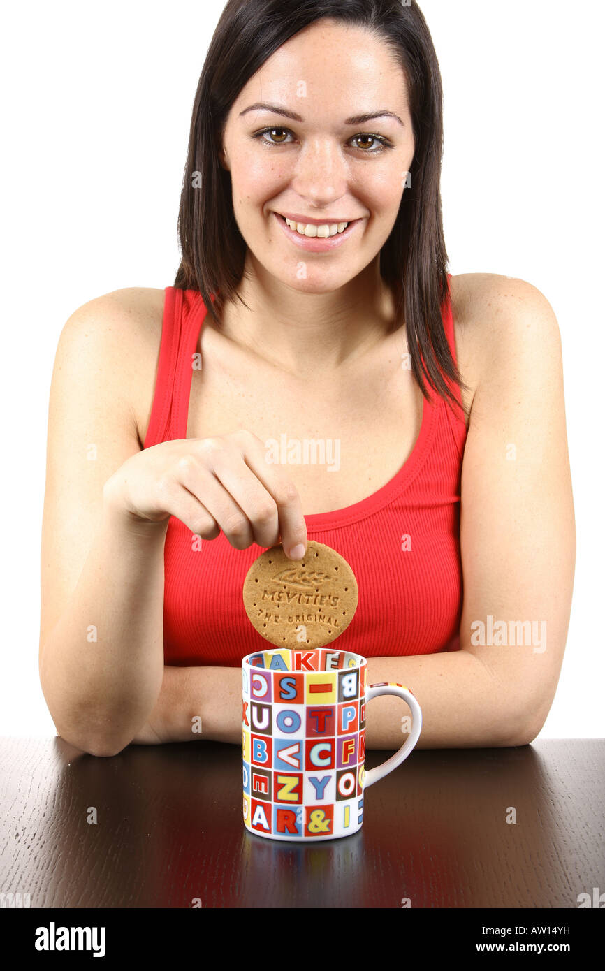 Dipping biscuit into tea hi-res stock photography and images - Alamy