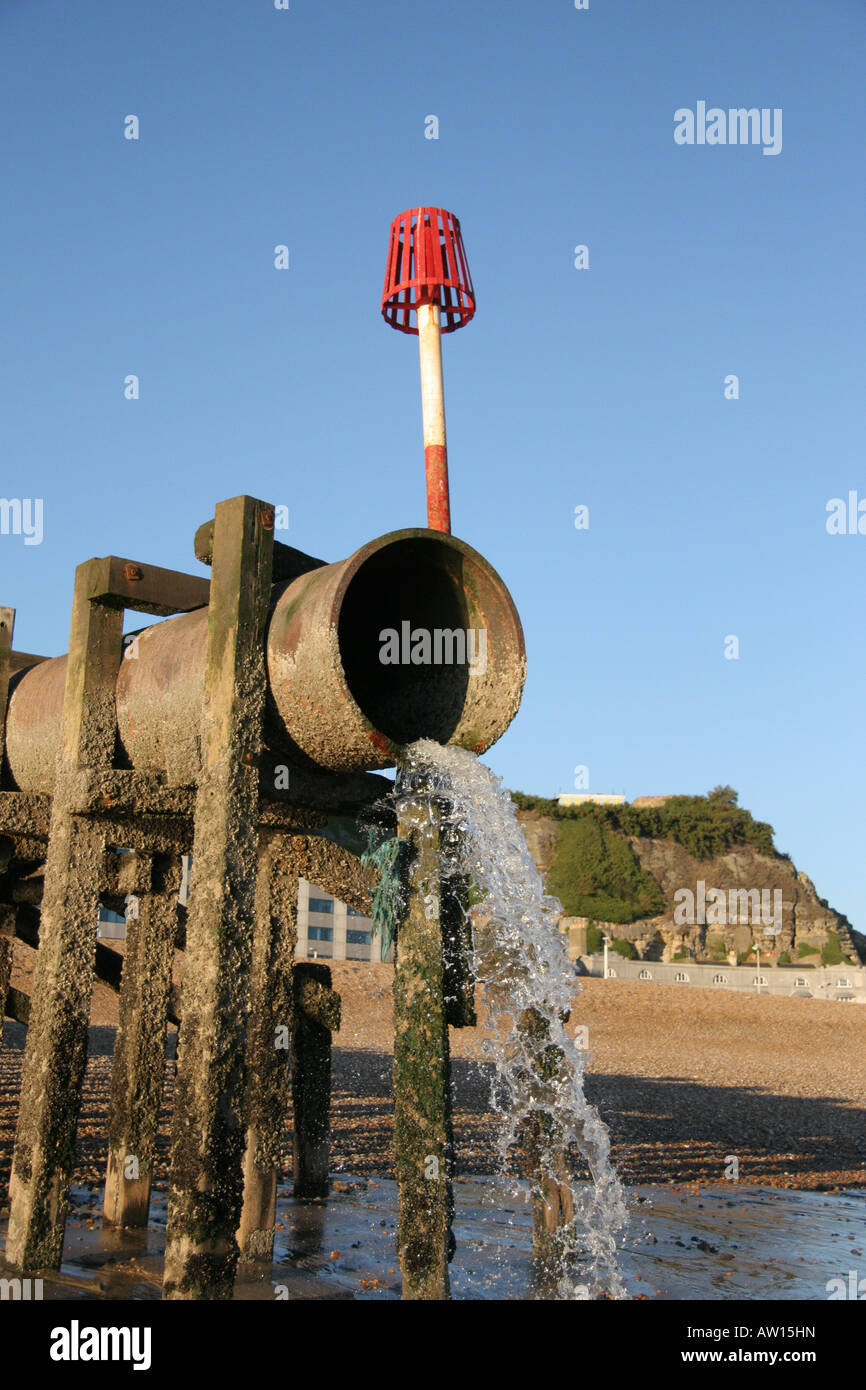 Outflow pipe on beach Stock Photo - Alamy