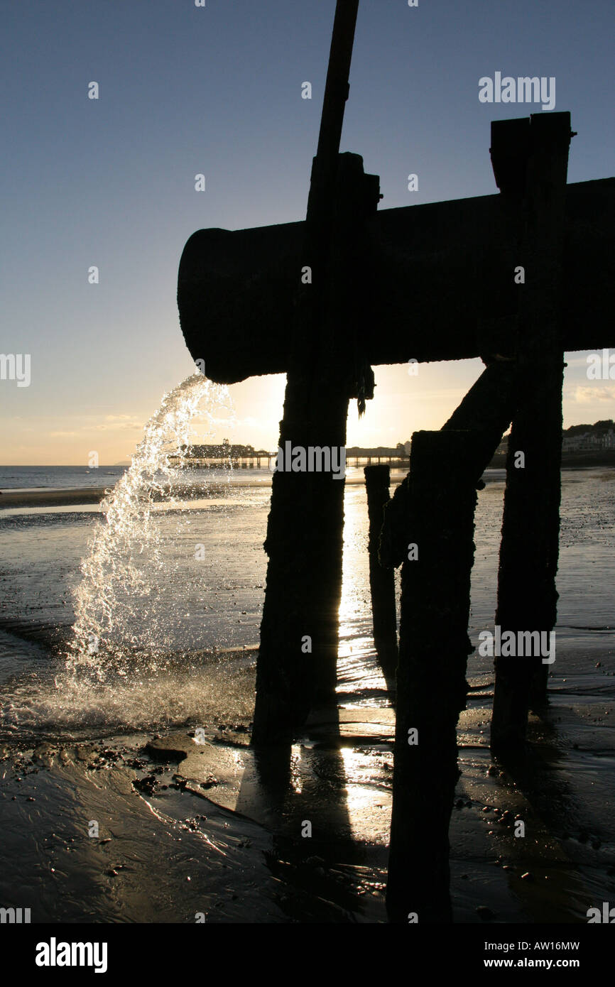 Outflow pipe on beach Stock Photo - Alamy