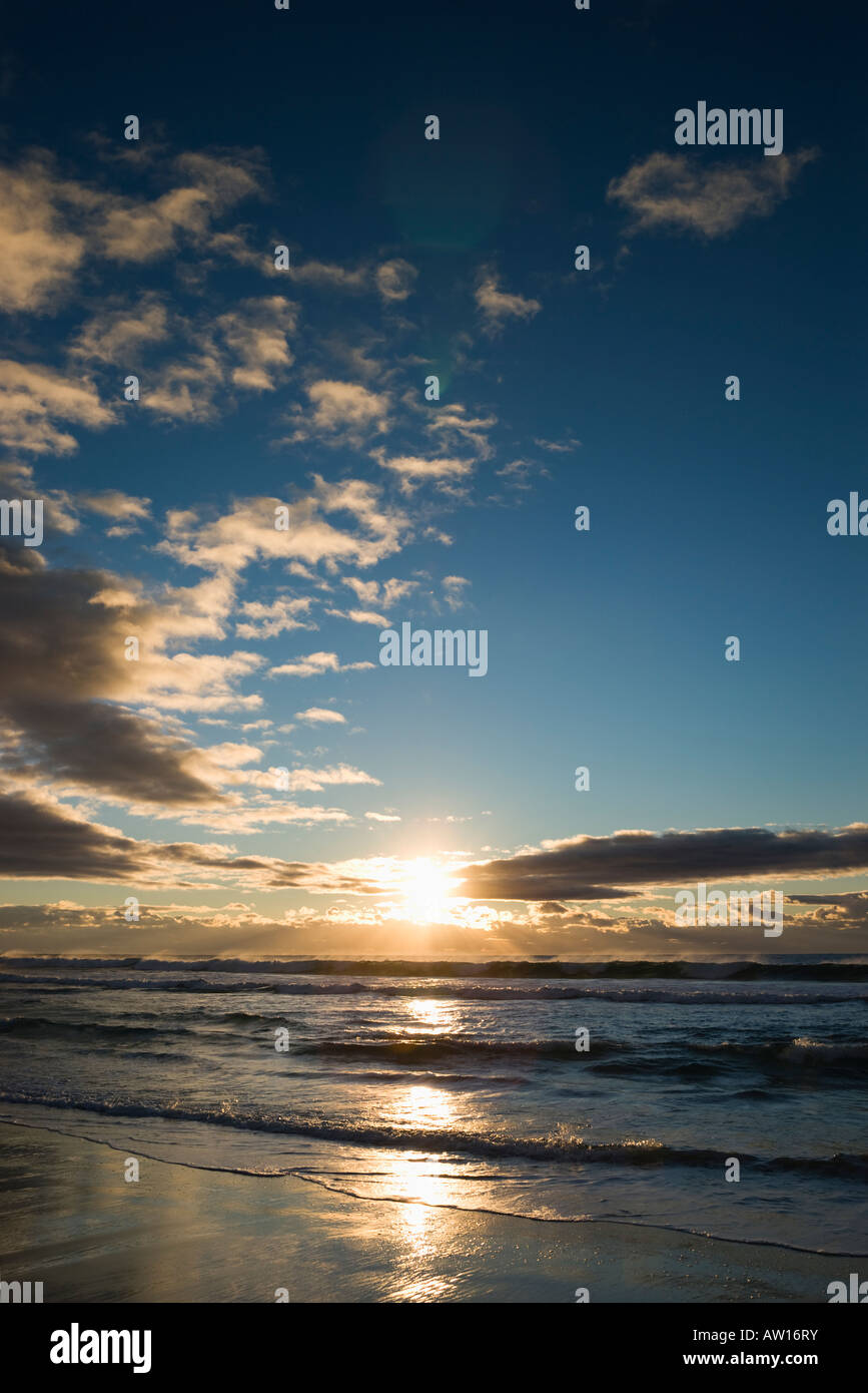 Sunset over ocean Stock Photo - Alamy
